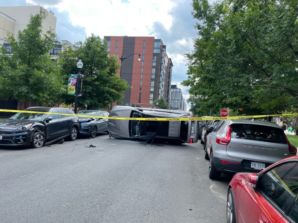 “Someone managed to flip a car onto its side and damage two other ...